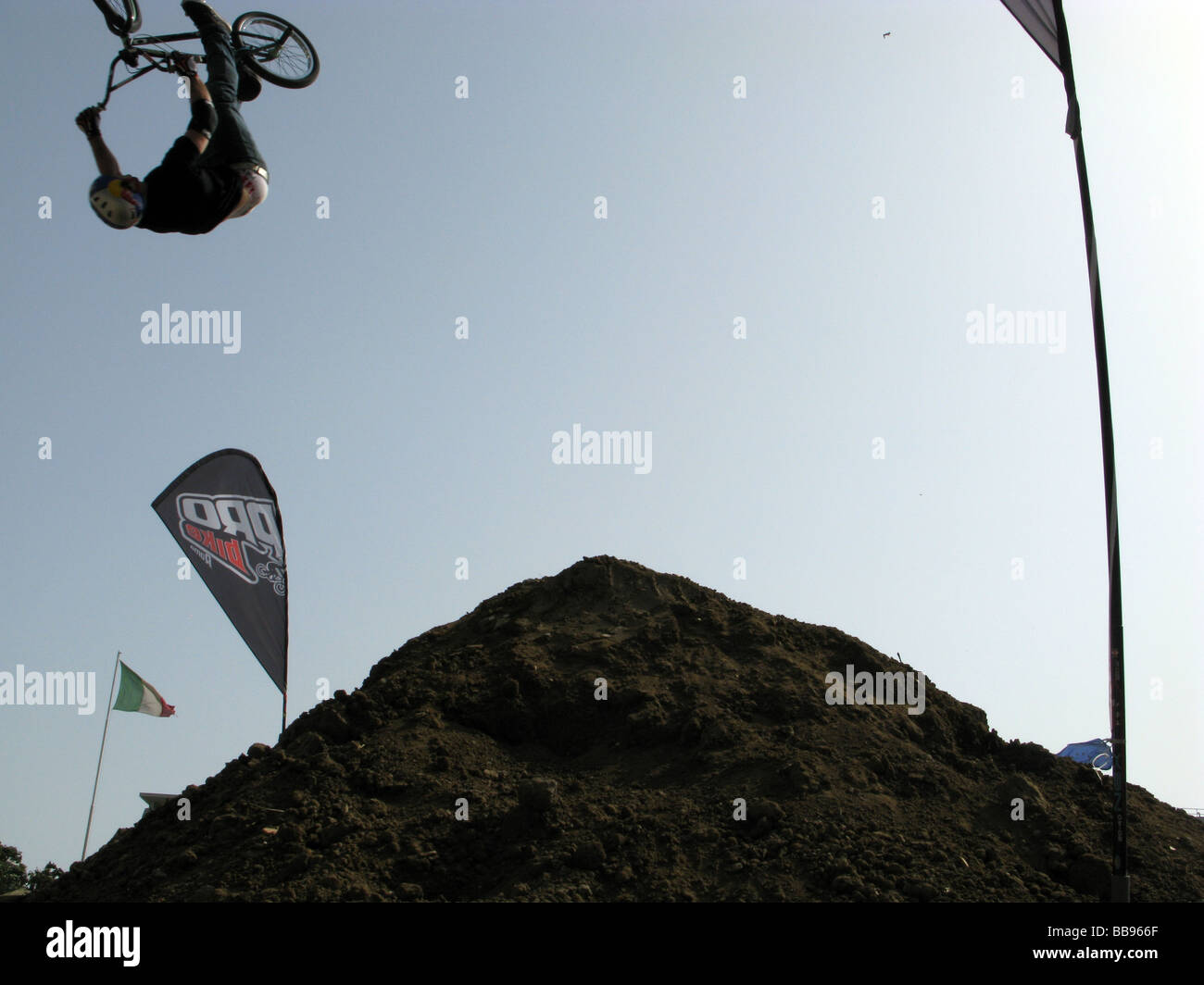 person doing bike stunts on ramp at event outdoors Stock Photo - Alamy