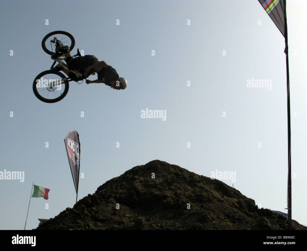 person doing bike stunts on ramp at event outdoors Stock Photo - Alamy