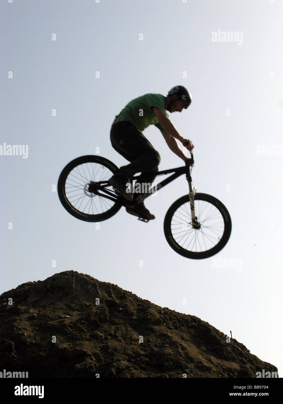 person doing bike stunts on ramp at event outdoors Stock Photo - Alamy