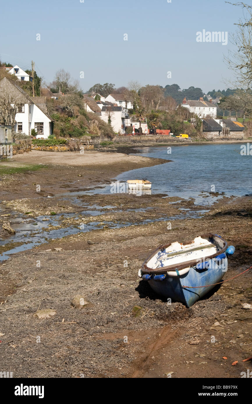 A rowing boat on the Helford River at low tide, Helford, Cornwall, UK ...
