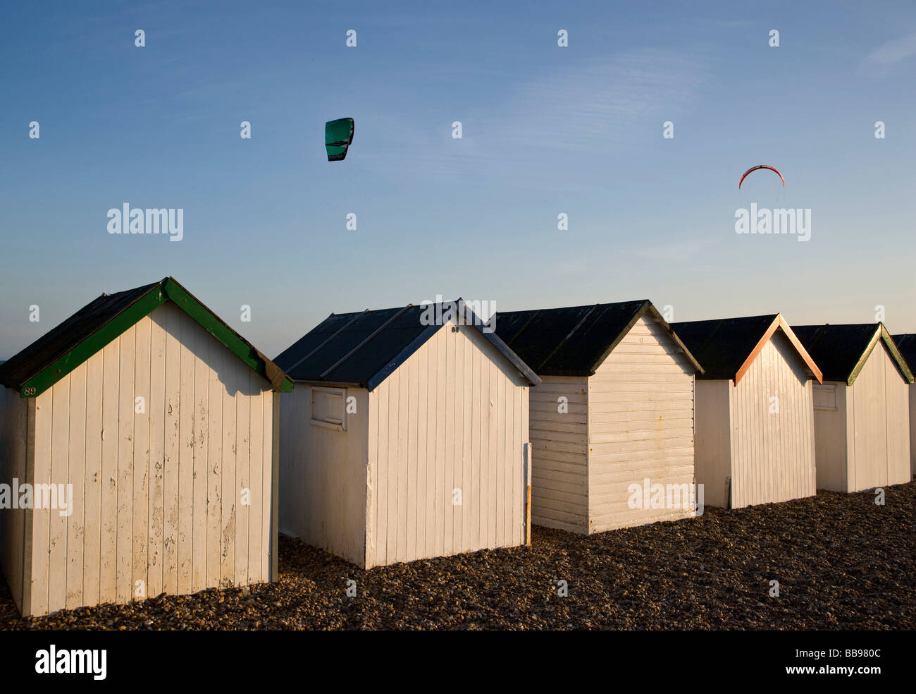 Kite Surfing and Beach Huts Stock Photo - Alamy