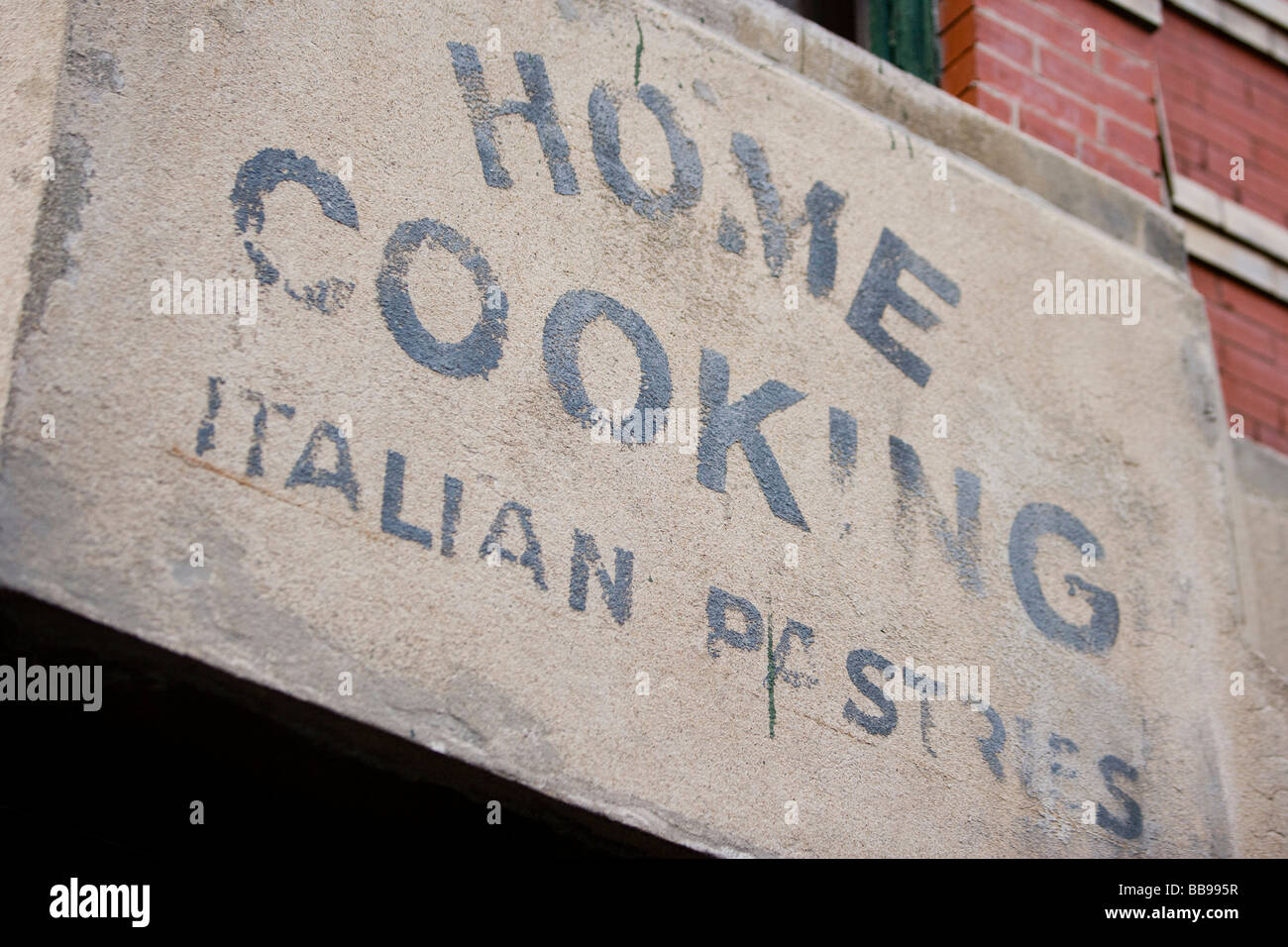 Weathered store front sign Stock Photo - Alamy