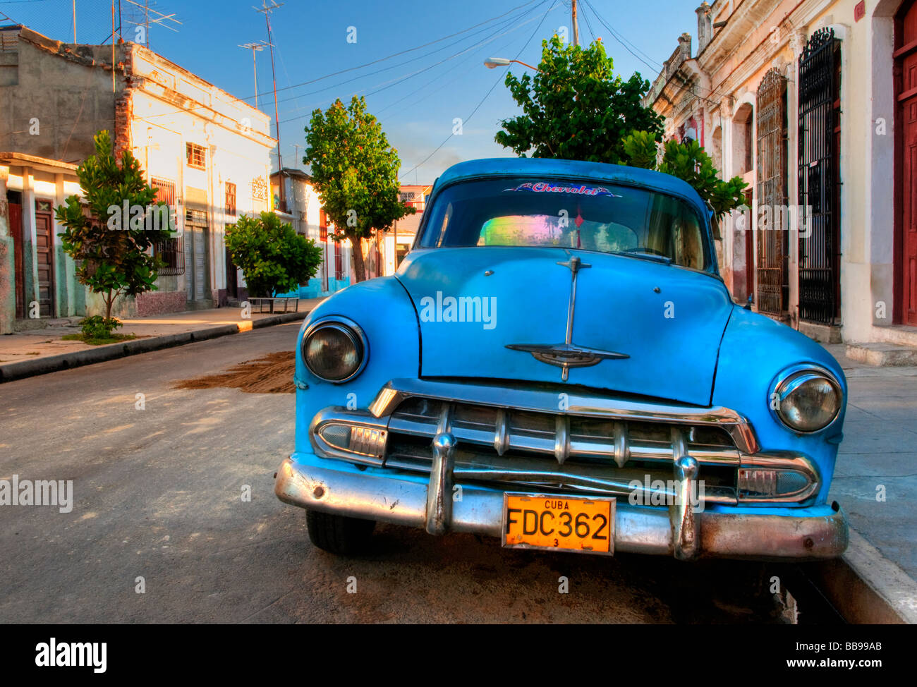 Blue car in Cienfuegos, Cuba, Caribbean Stock Photo - Alamy