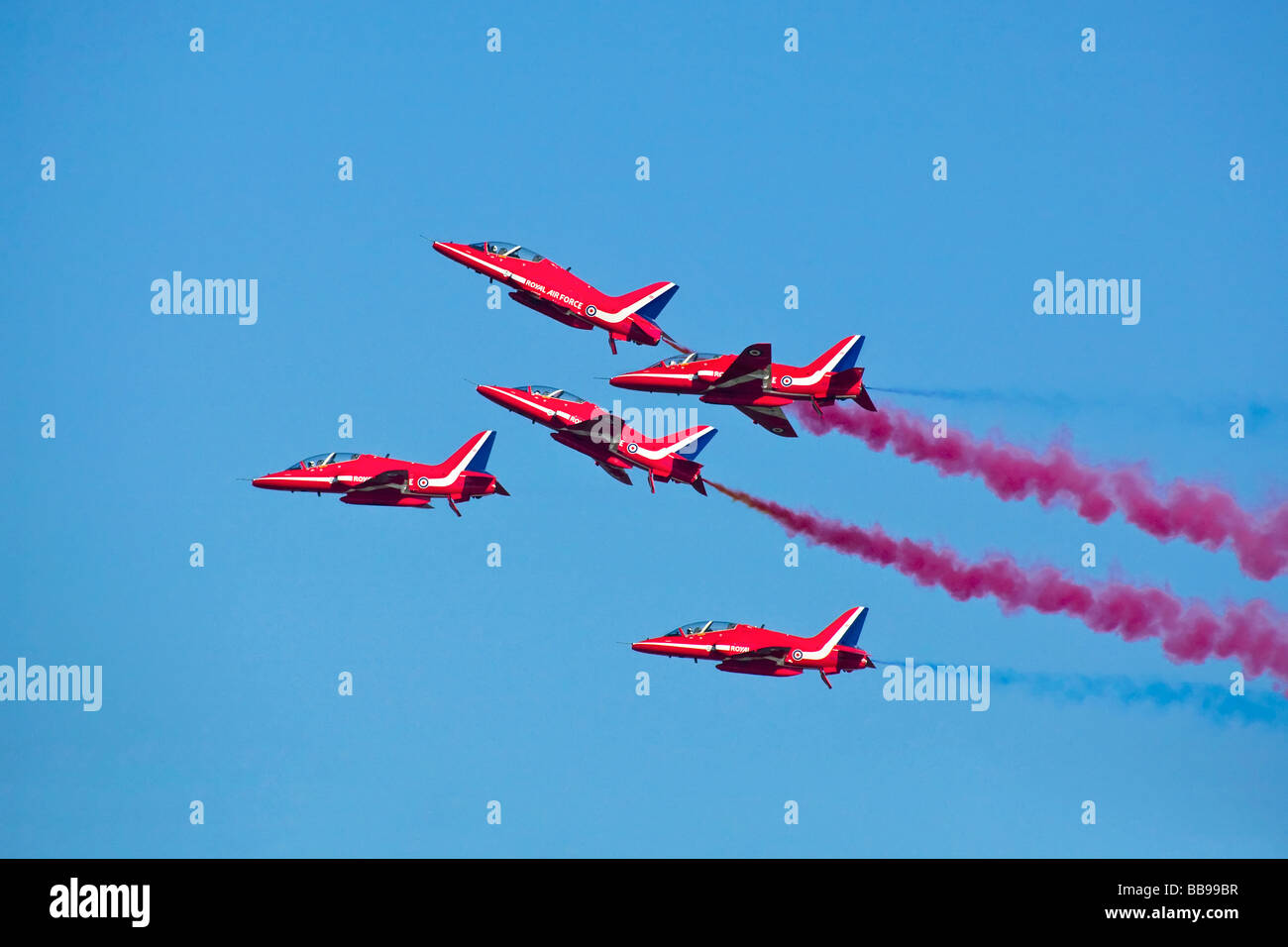 Red Arrows formation break Stock Photo - Alamy