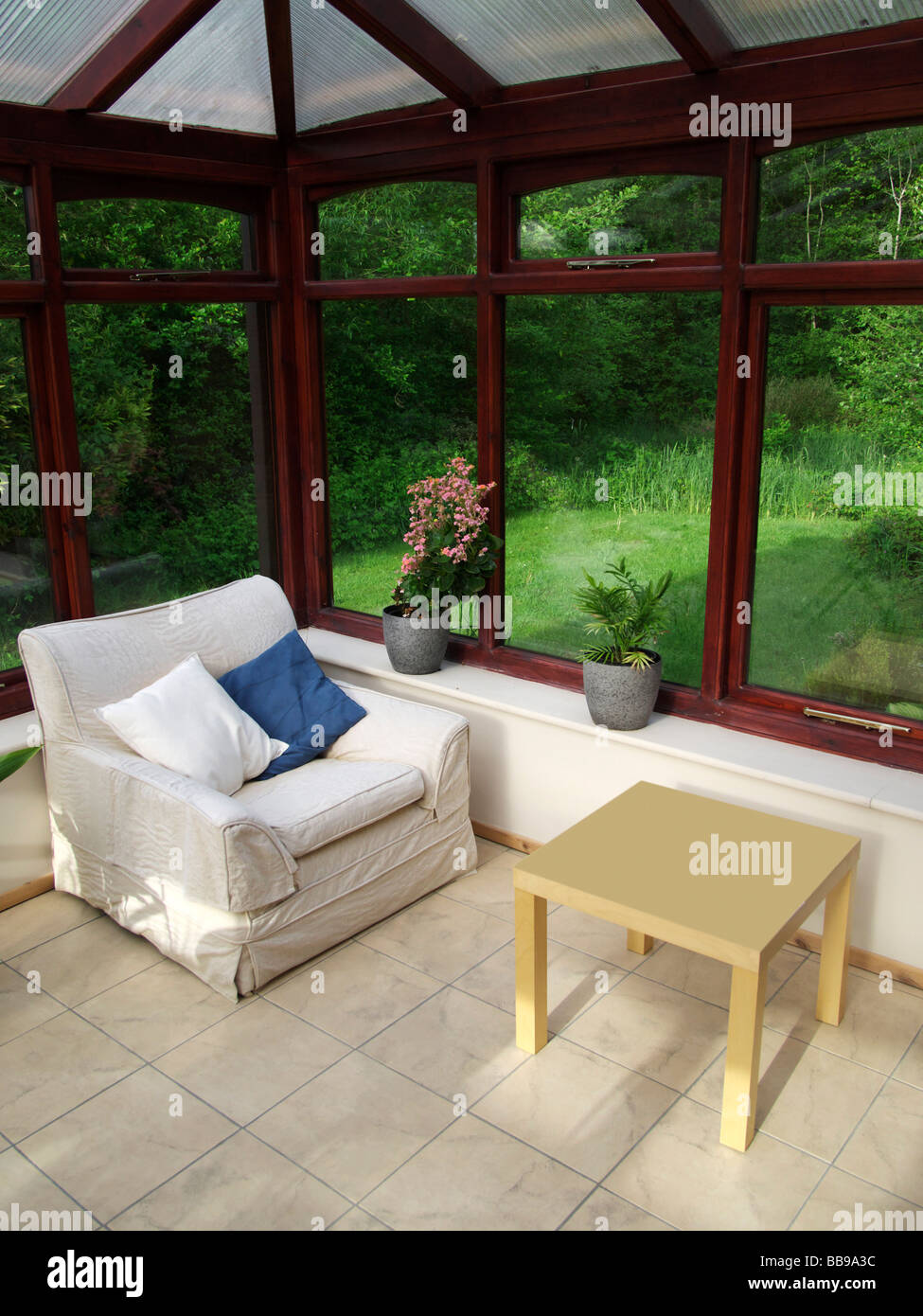 conservatory tables chairs home interior Stock Photo - Alamy