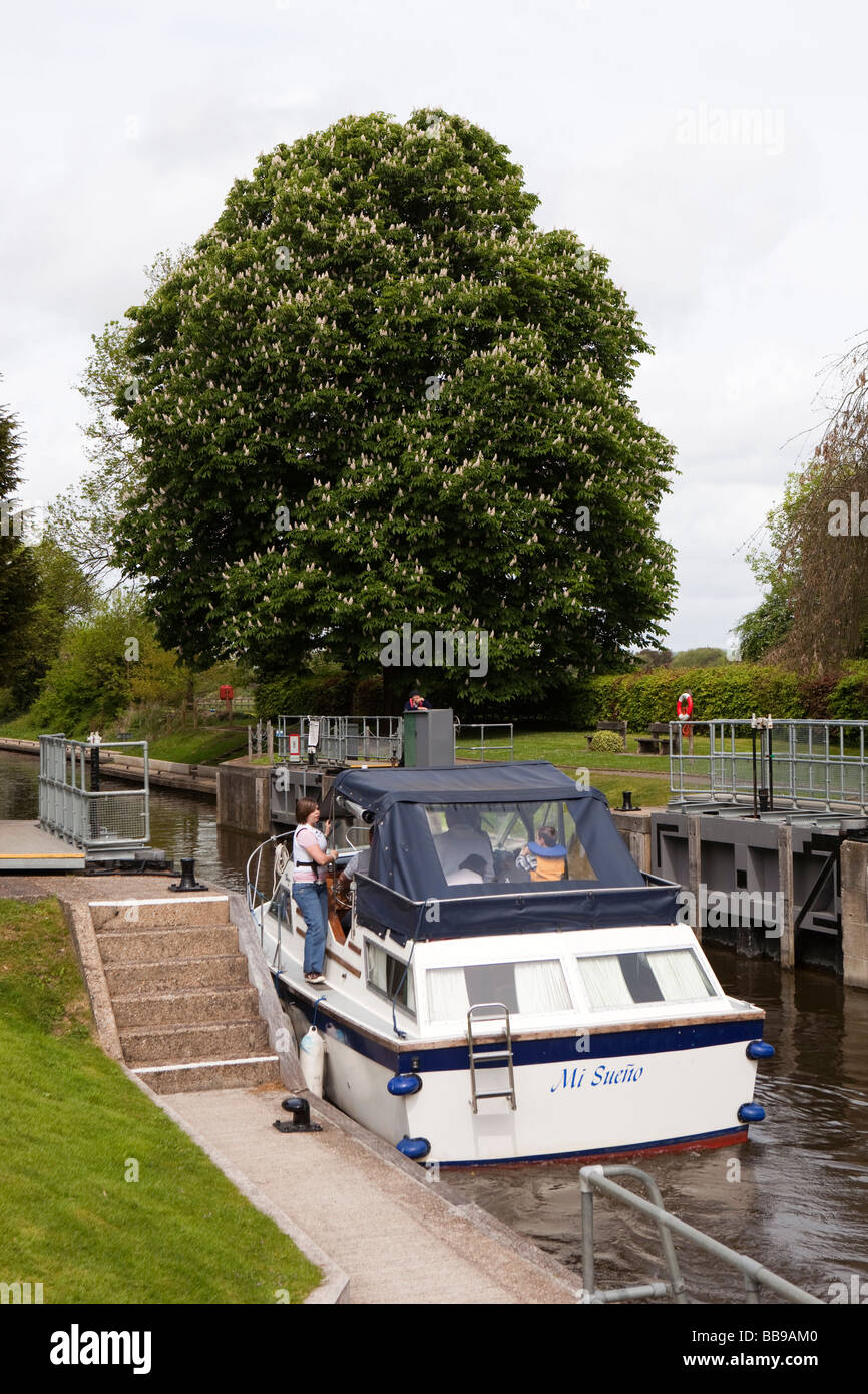 England Berkshire Cookham Locks cabin cruiser passing through the lock ...