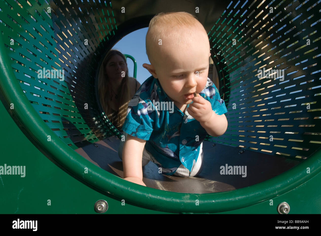 Baby at Playground Stock Photo - Alamy