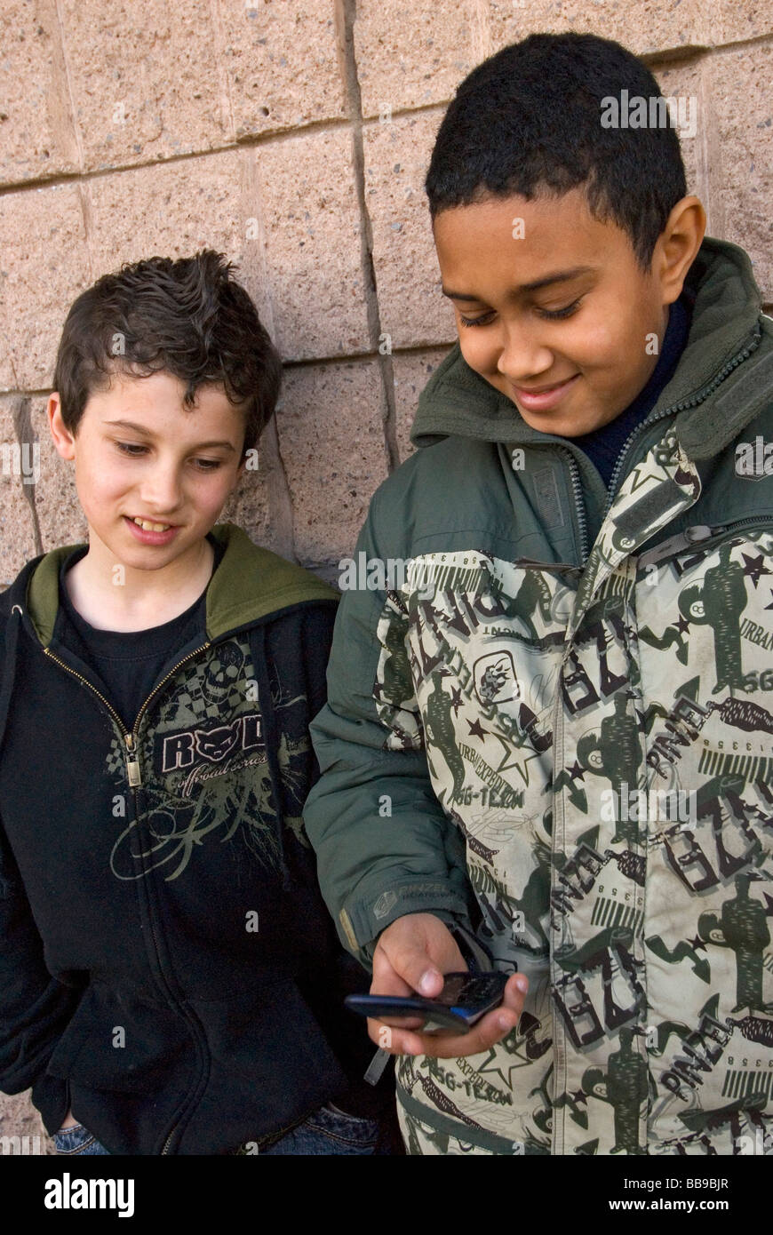 Boys with Mobile phone Stock Photo - Alamy