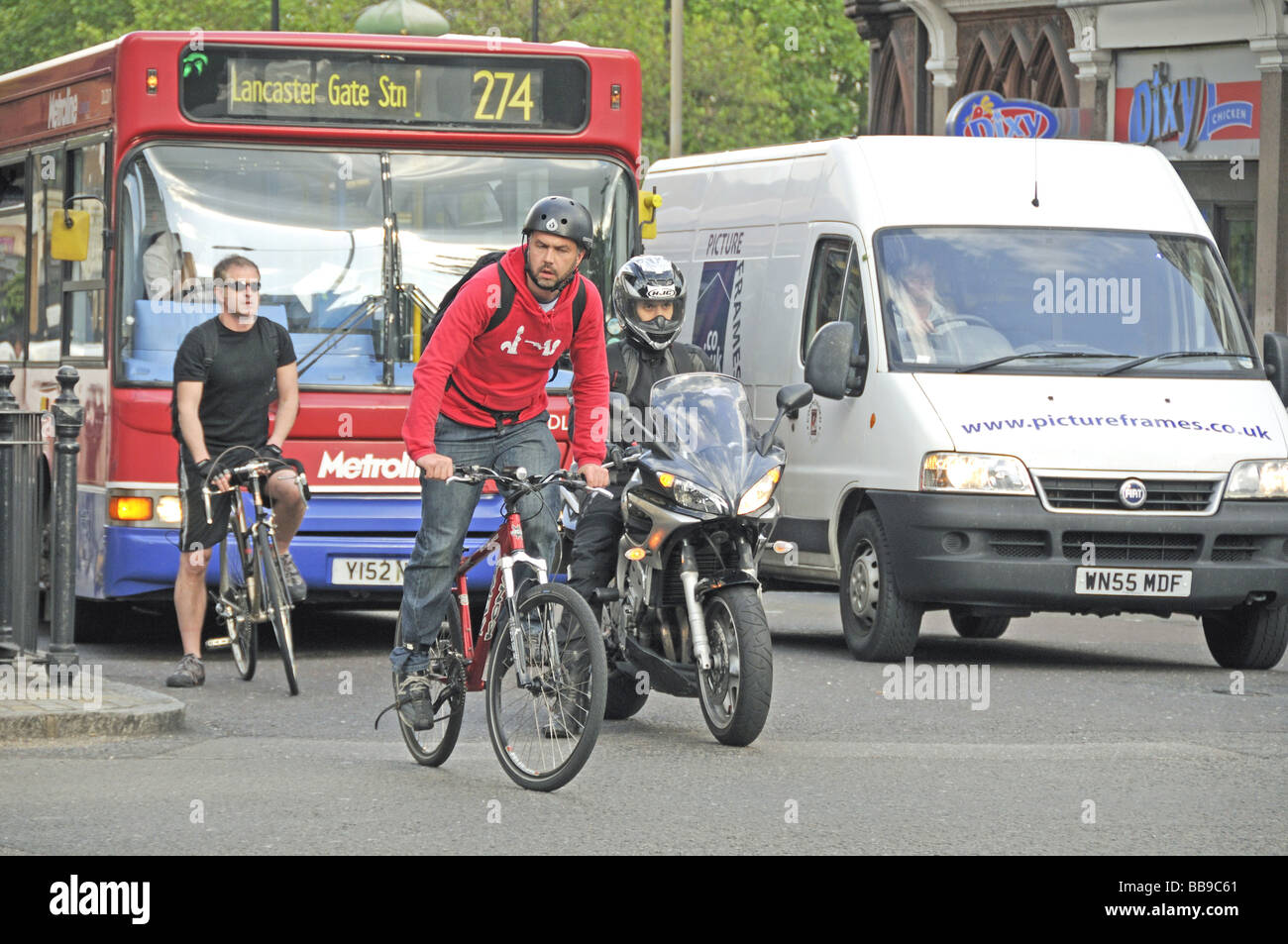 Cyclists in rush hour traffic Angel Islington London UK Stock Photo - Alamy