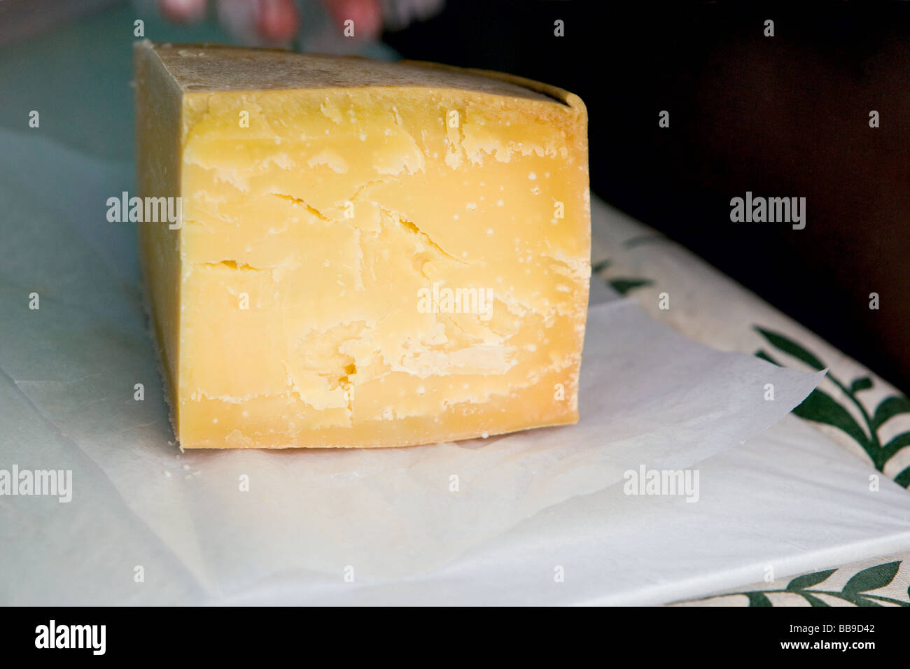 Large block of cheese Stock Photo - Alamy