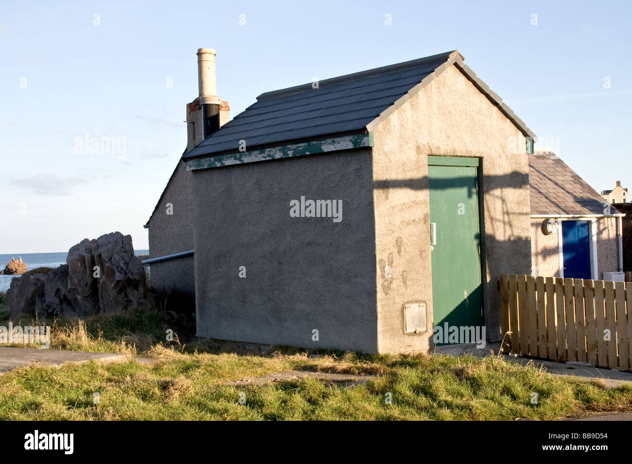 Fishing shack fence gray cement door hi-res stock photography and ...
