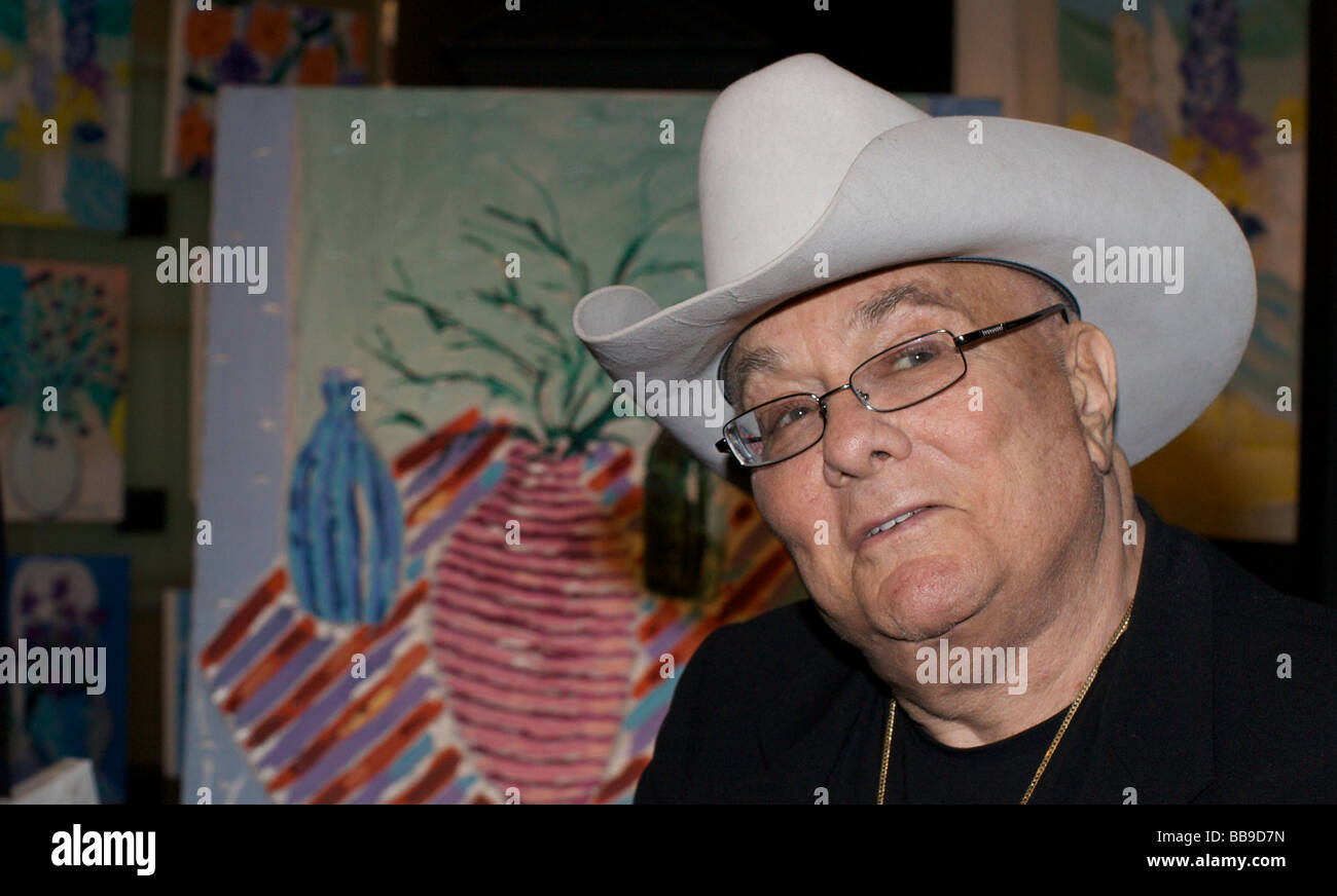 Tony Curtis and his new painting that go on sale in Harrods today ...