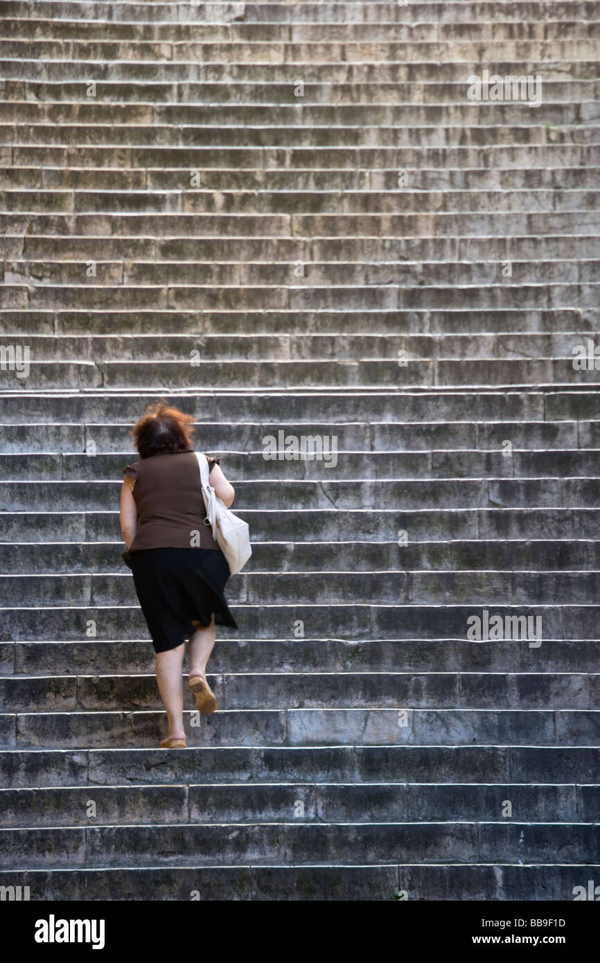 People climbing the steep steps linking the Baptistry to the Piazza del ...
