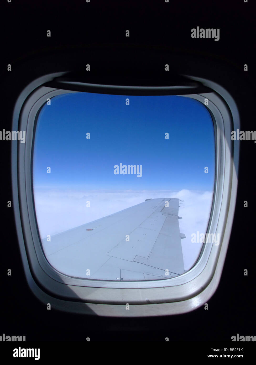 Looking out of the window on an Embraer ERJ 145 airplane Stock Photo ...