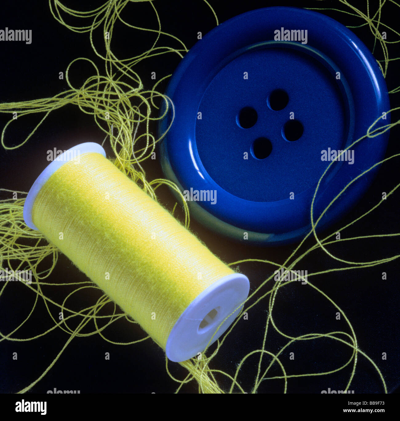 button and thread Stock Photo - Alamy