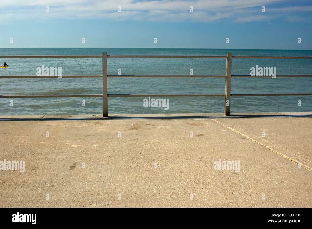 Railings on the promenade at the seaside Stock Photo - Alamy