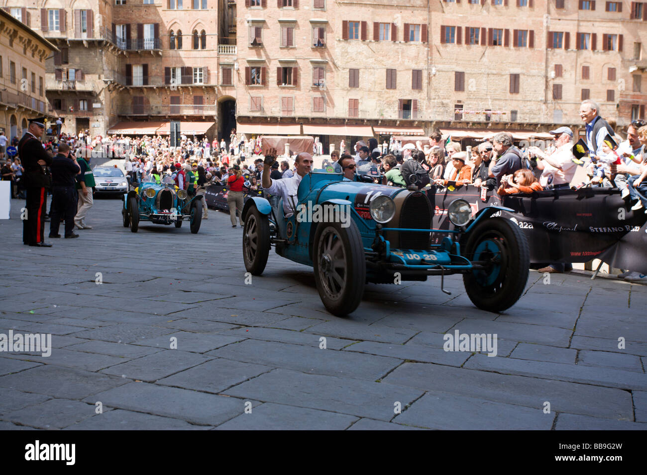 two vintage Bugatti cars arriving at Siena, Mille miglia rally 2009 ...