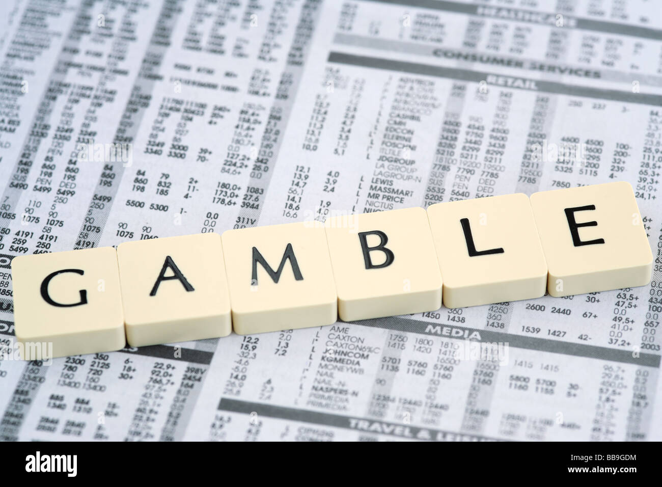 Word tiles spelling Gamble Stock Photo - Alamy