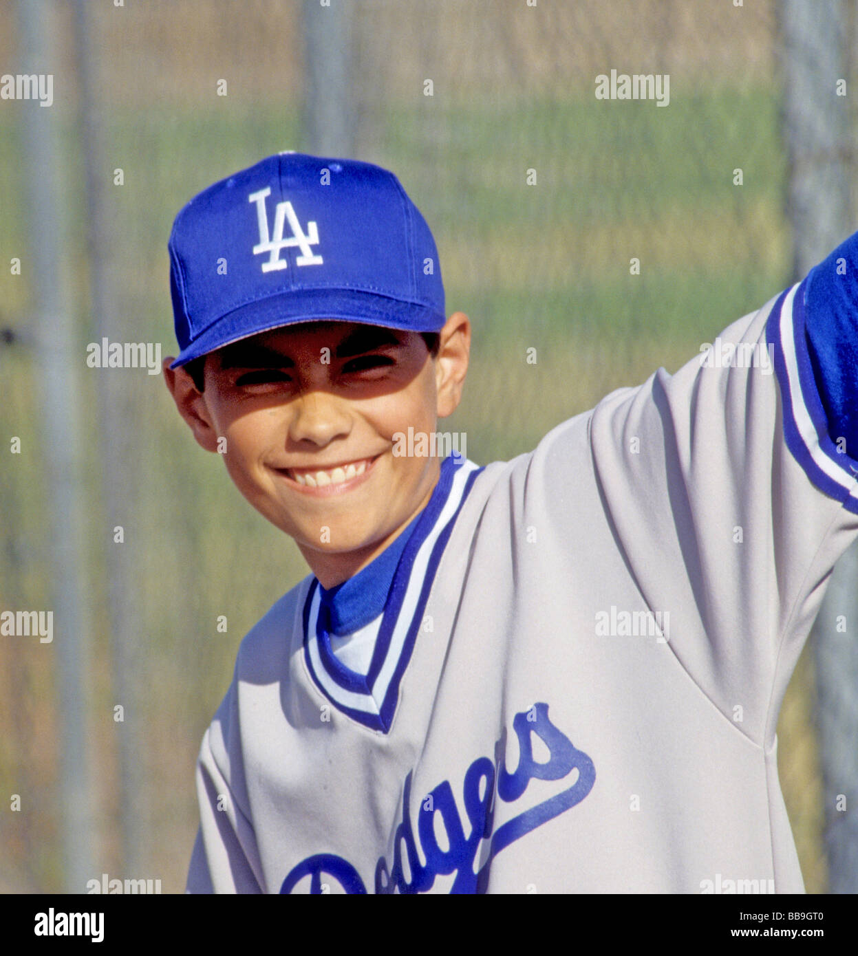 boy baseball uniform smile happy sport play little league Stock Photo ...