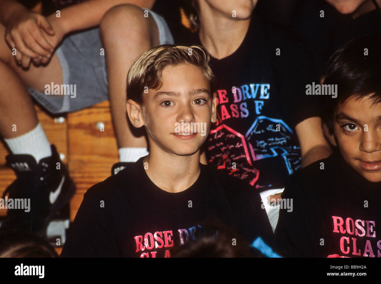 Boy group student smile alert listen friend blond face happy Stock ...