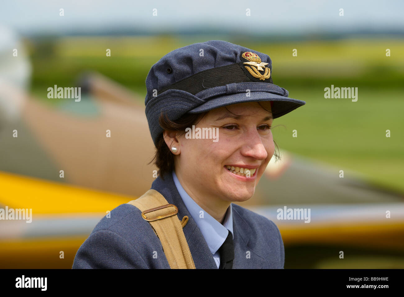 Young lady wearing WRAF uniform and smiling as seen at Shuttleworth ...