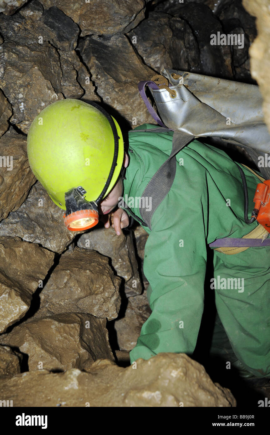 Year 5 schoolchild on a caving expedition in Mouldridge mine ...