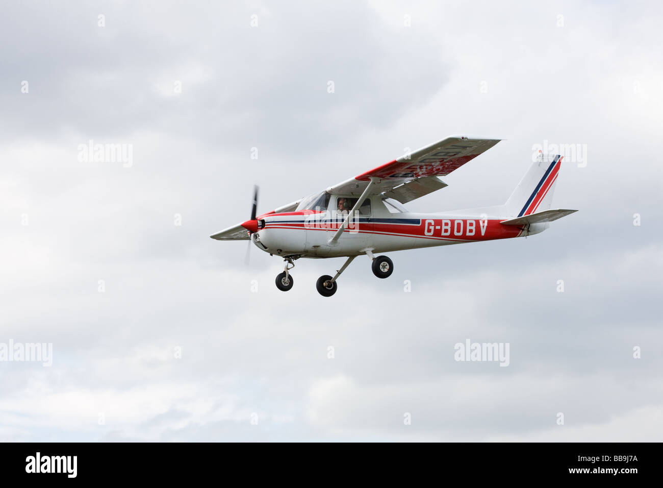 Reims Cessna F150M G-BOBV in flight on final approach to land at ...