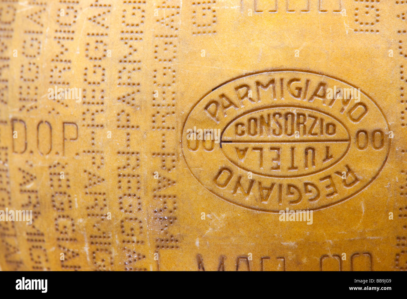 Seal on the rind of a parmesan cheese Stock Photo - Alamy