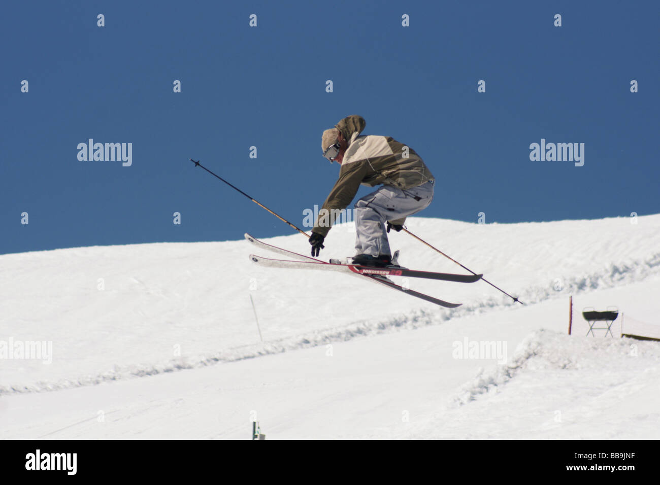 Winter Sports;Ski-ing; Male in middle of a jump Stock Photo - Alamy