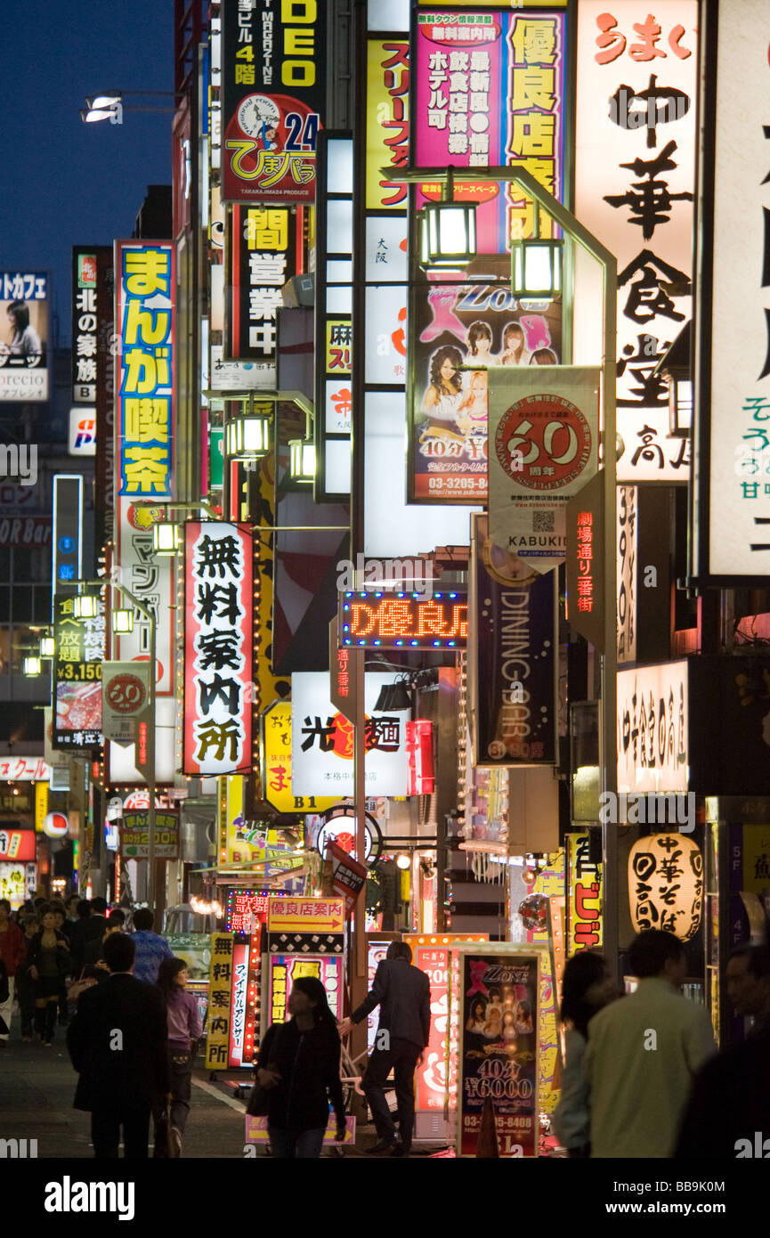 Neon signs at dusk in the Kabukicho area Shinjuku district Tokyo Japan ...