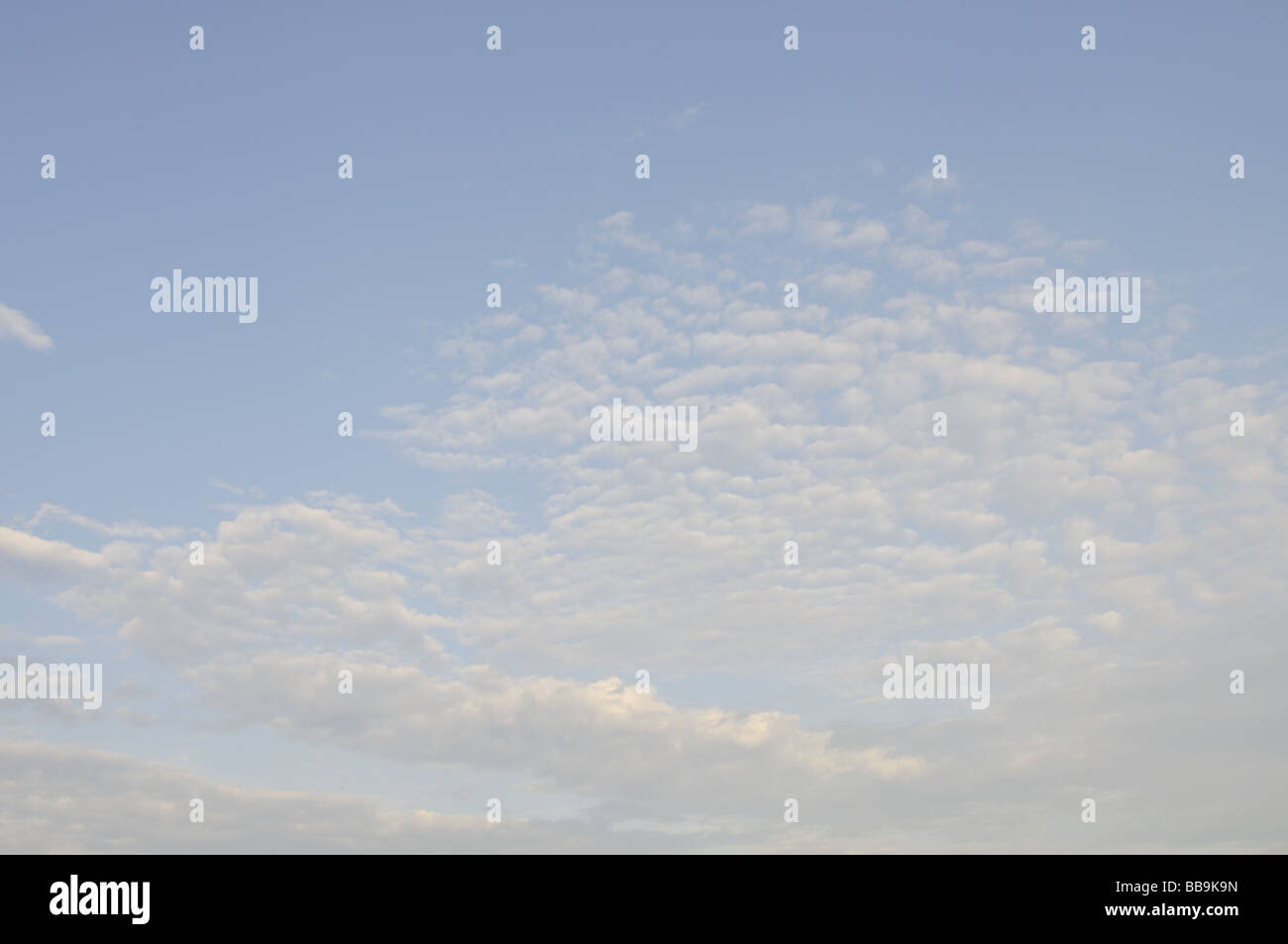 Sunny blue sky with clouds Stock Photo - Alamy