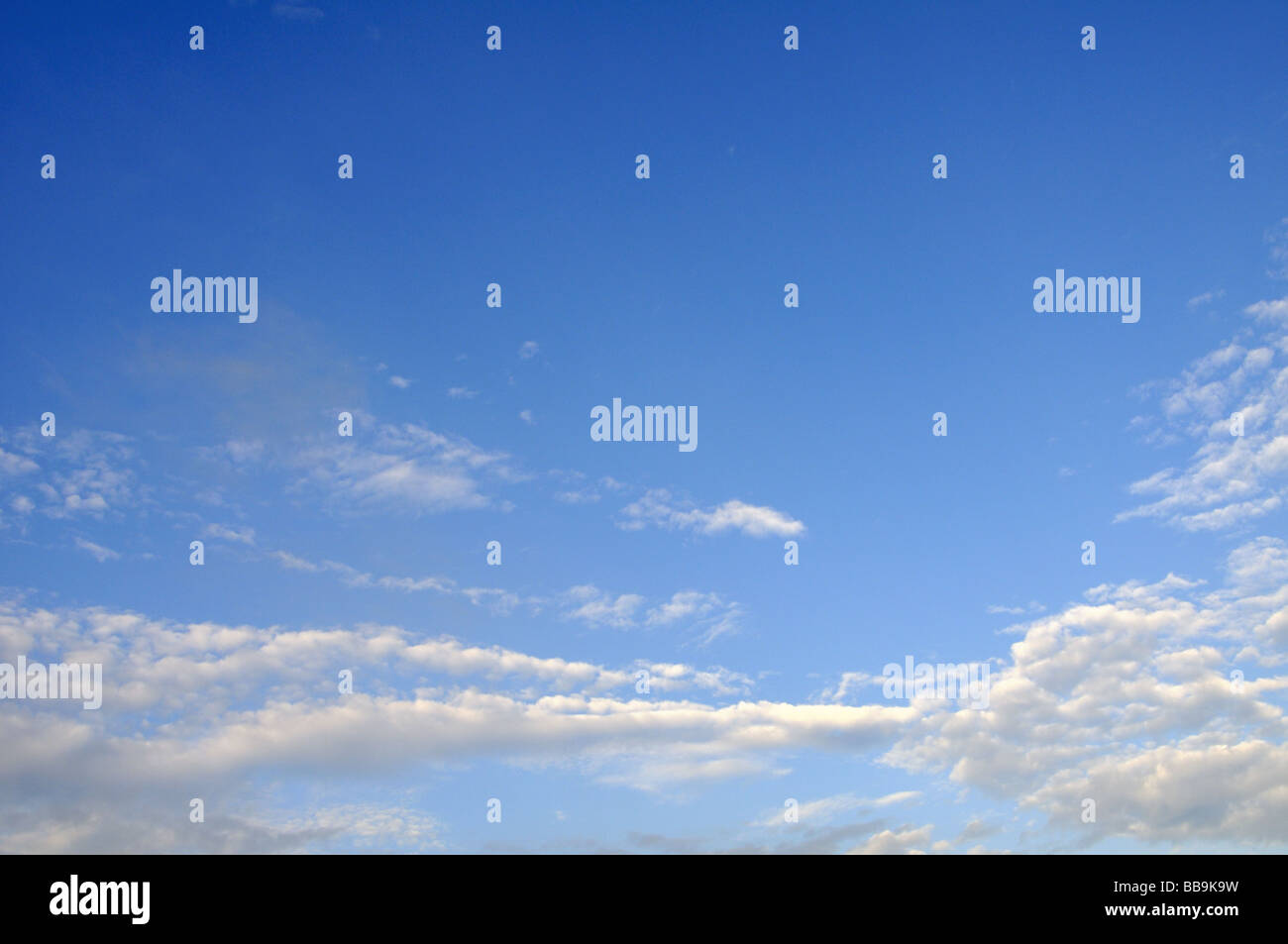 Sunny blue sky with clouds Stock Photo - Alamy