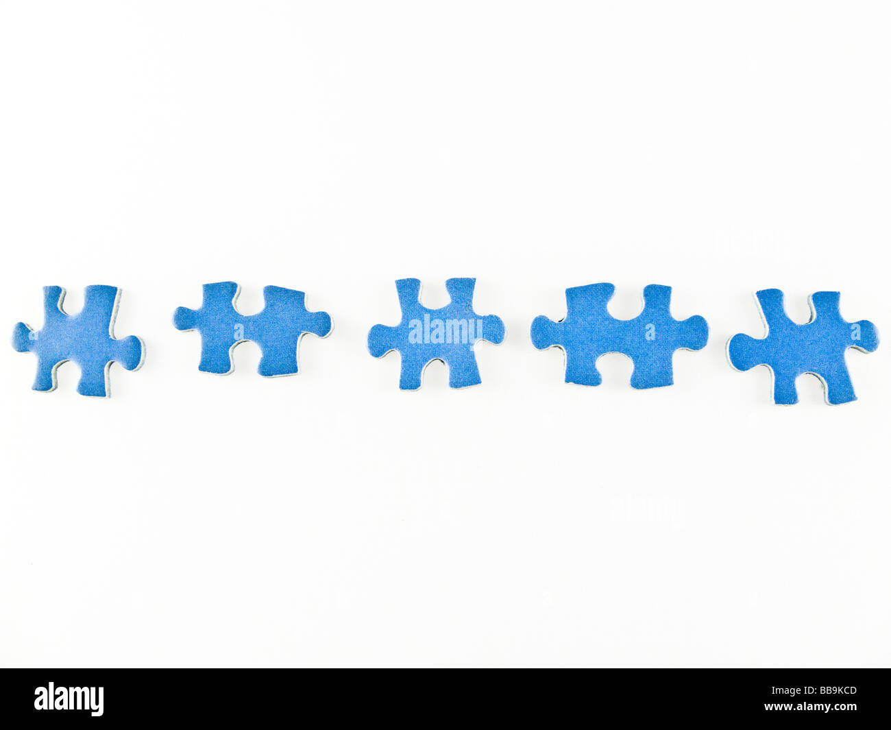 Line of puzzle Stock Photo - Alamy
