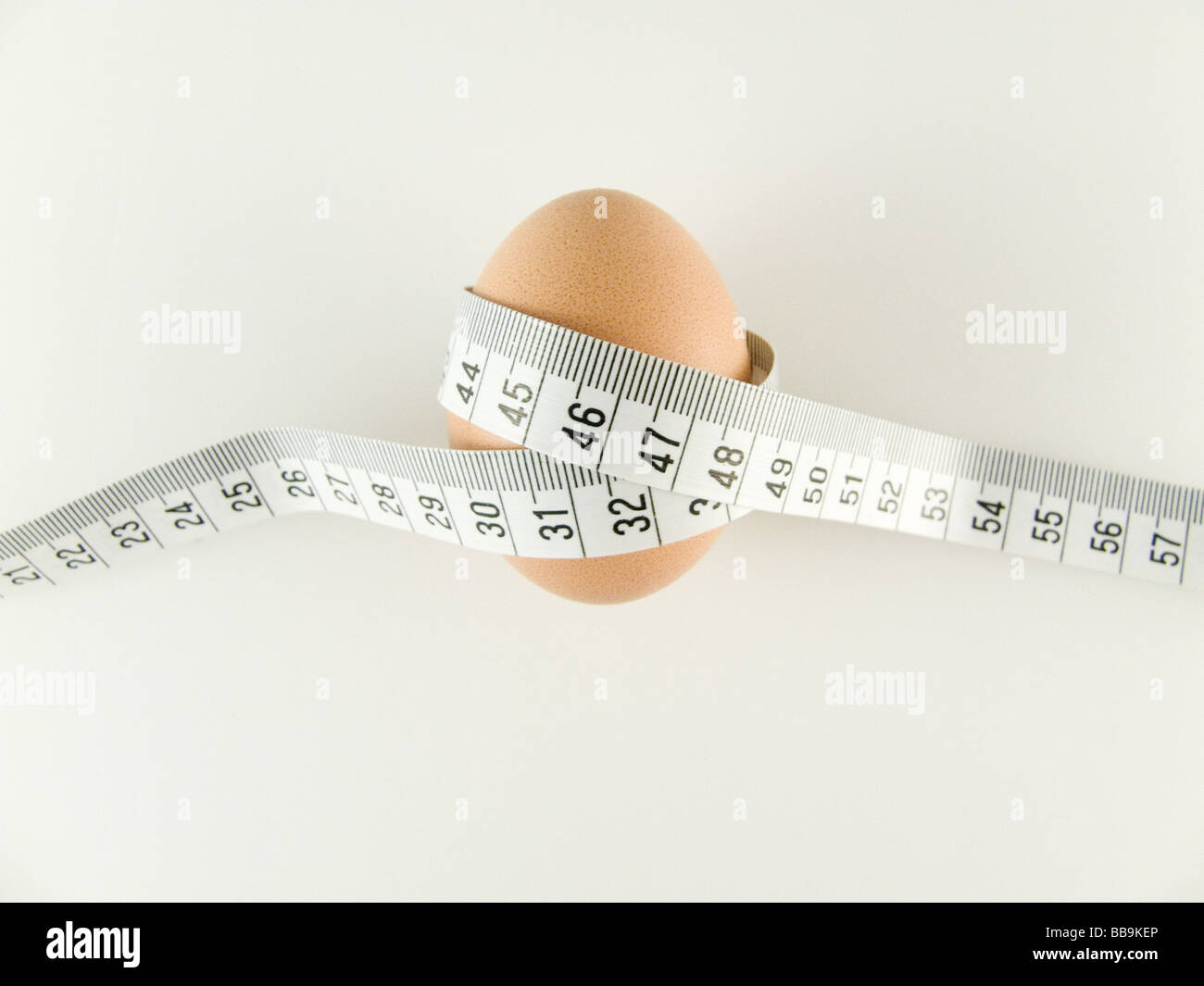 Fit egg with measure Stock Photo - Alamy