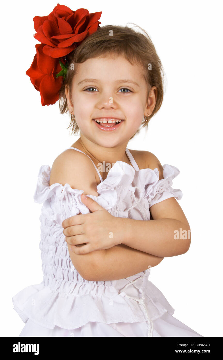 Little girl with red rouses in the hair Stock Photo - Alamy