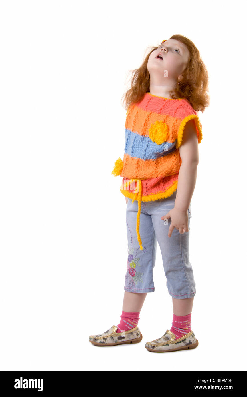 Little curiosity girl isolated on white Stock Photo - Alamy