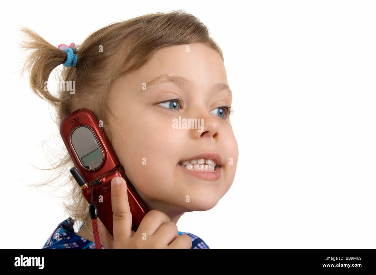 Pretty smiling girl talking at mobile phone Stock Photo - Alamy