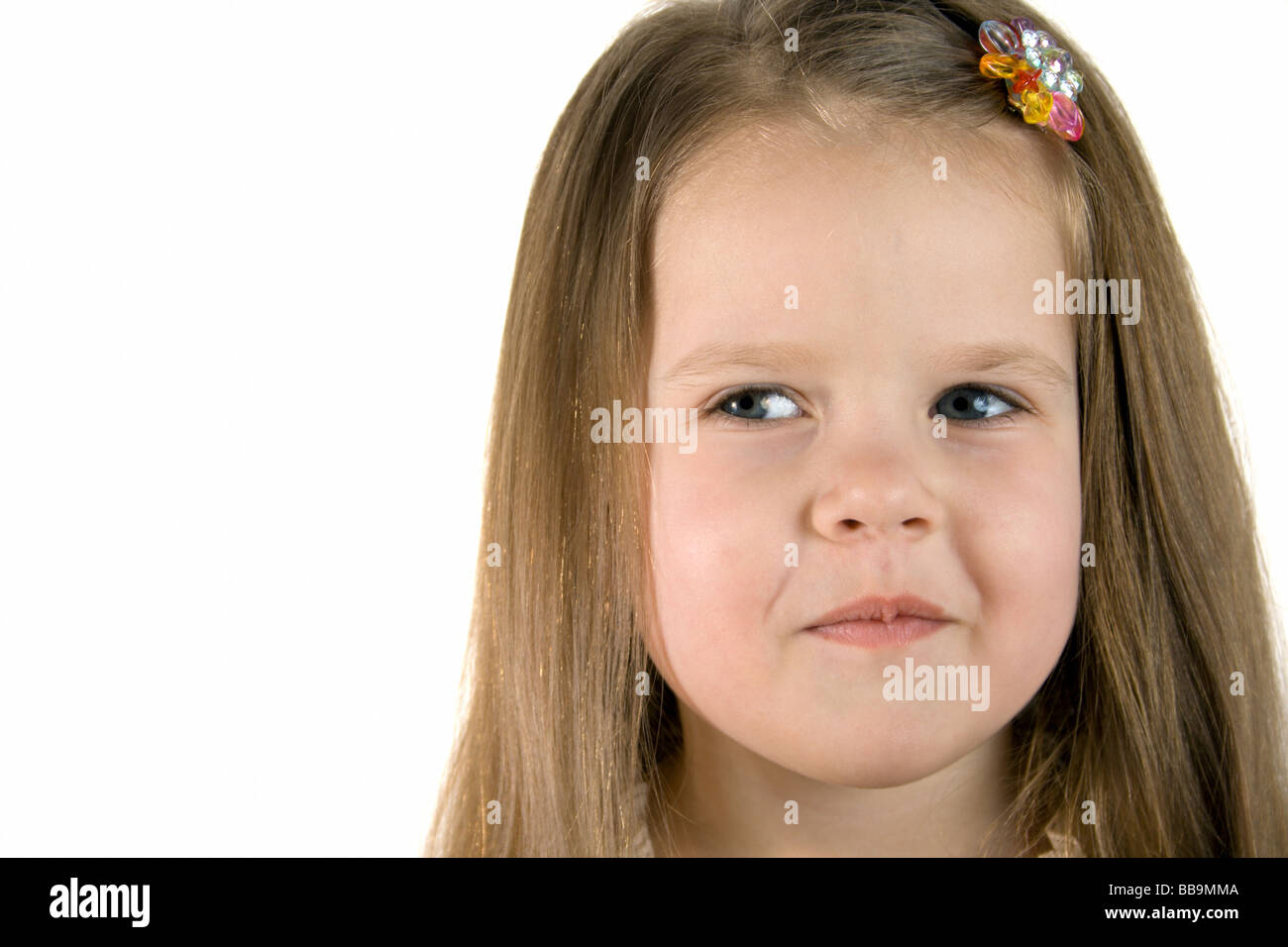 Little smiling girl look right close up Stock Photo - Alamy