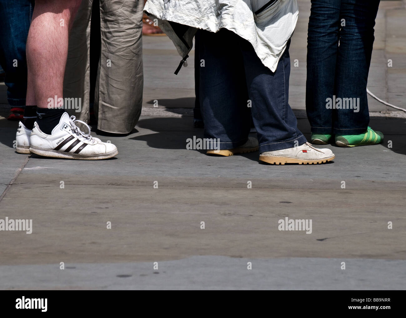 People standing in a queue. Photo by Gordon Scammell Stock Photo - Alamy