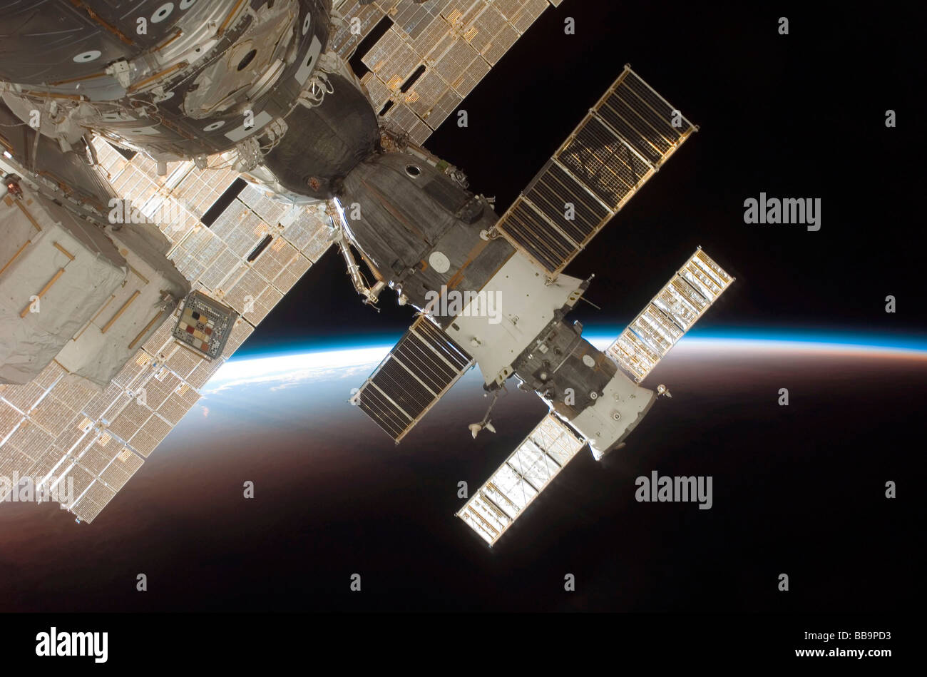 International Space Station floating above earth Stock Photo - Alamy