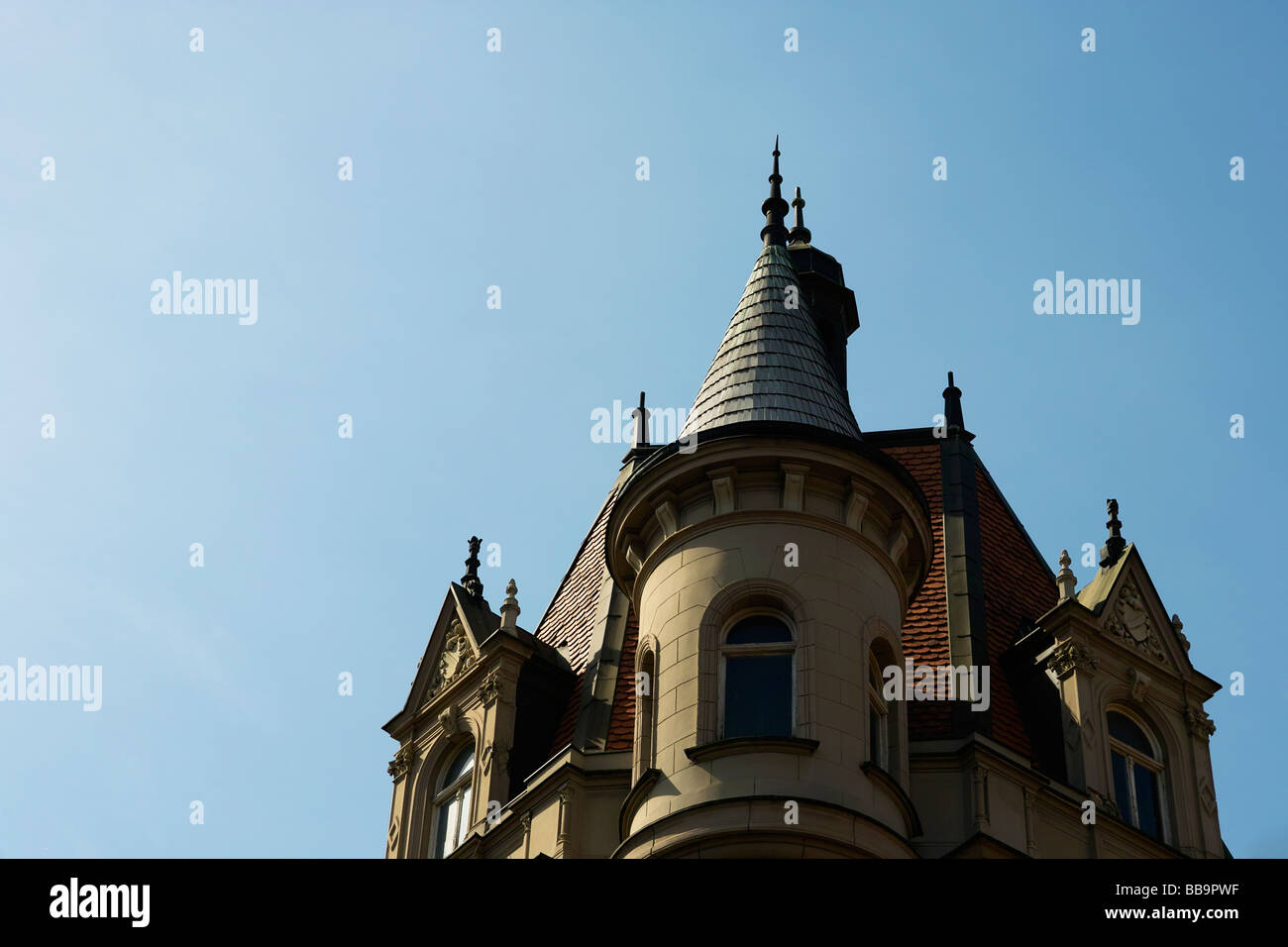 Rook tower fort shaped front of an old building Stock Photo - Alamy