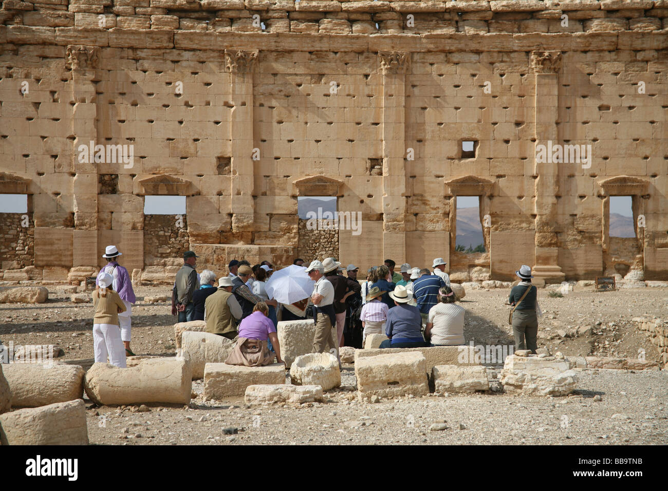 Temple of Bel Roman ruins, with a tour group, Palmyra Syria Stock Photo ...