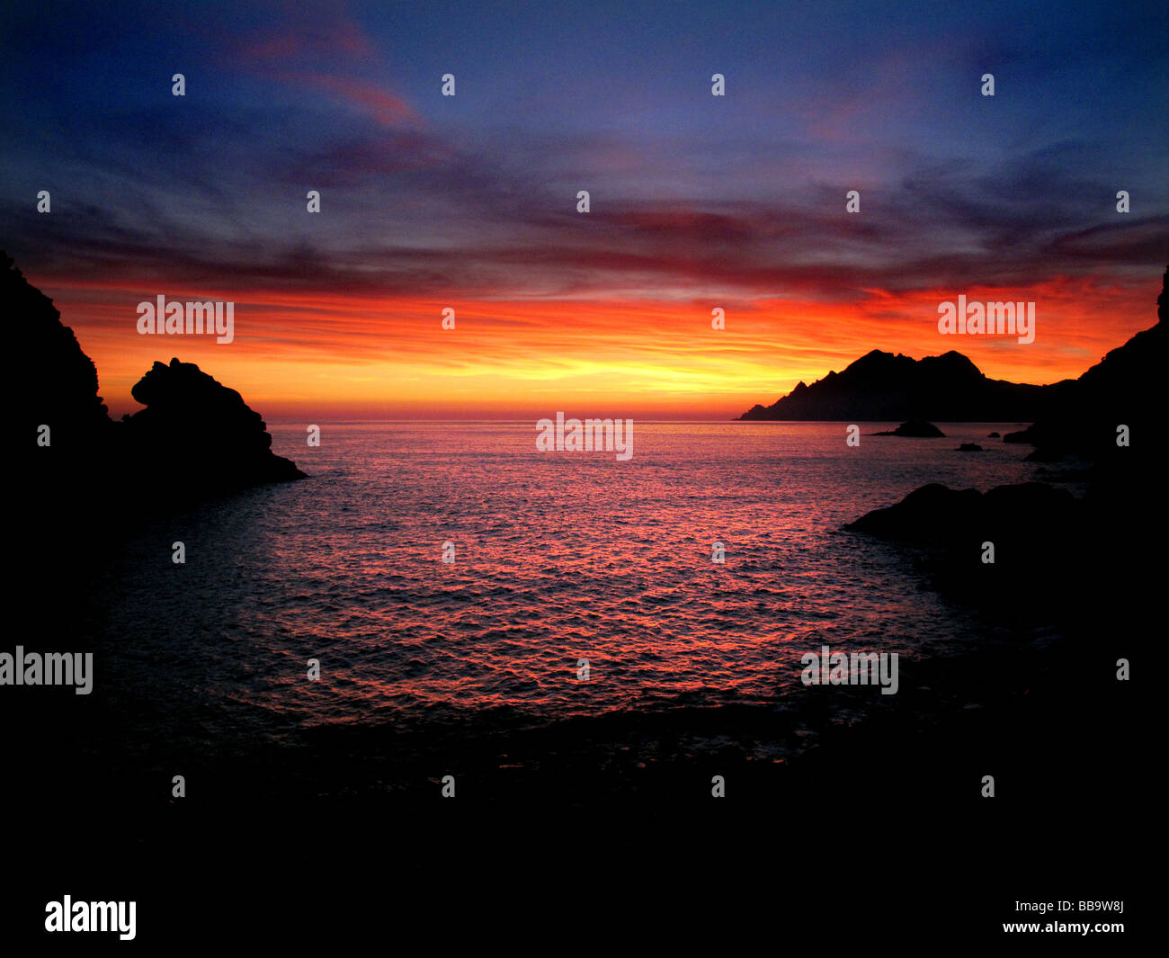 Sunset in the gulf of Porto in Corsica. Porto is famous for it's ...