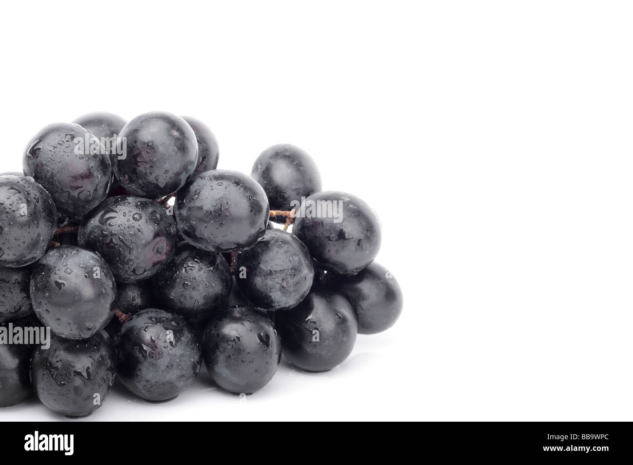 Grapes closeup isolated over white background Stock Photo - Alamy