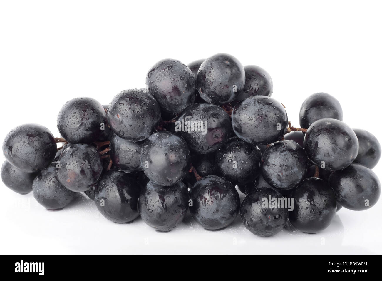Grapes closeup isolated over white background Stock Photo - Alamy