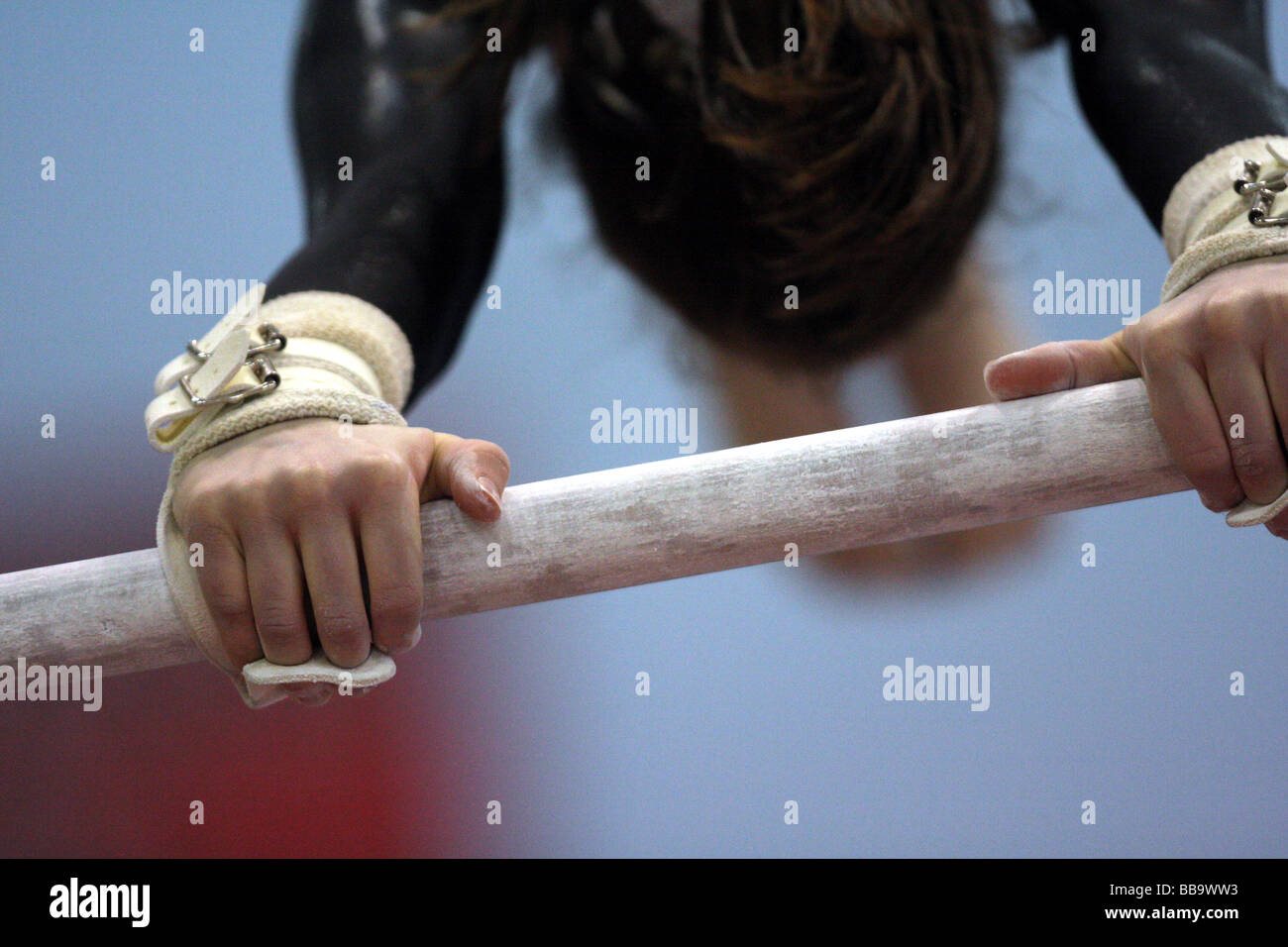 Female gymnast on high bar hi-res stock photography and images - Alamy