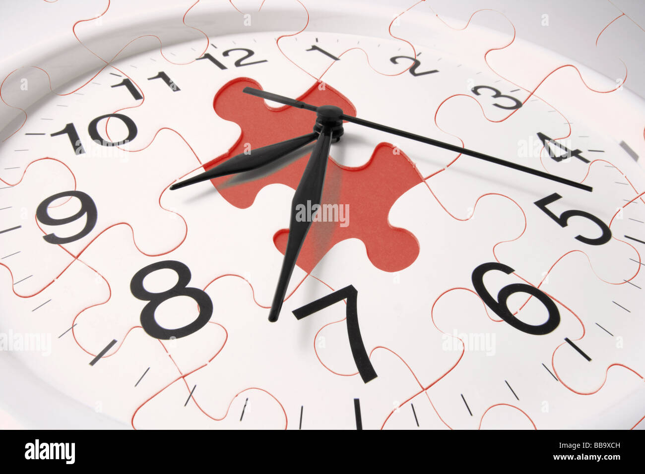Jigsaw puzzle piece clock hi-res stock photography and images - Alamy