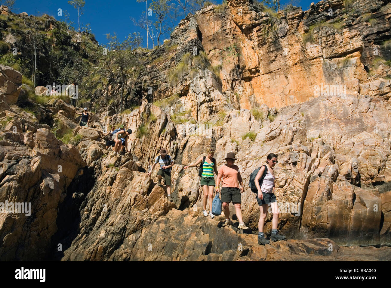 Tourists hike down to Maguk (Barramundi Gorge) in Kakadu National Park ...