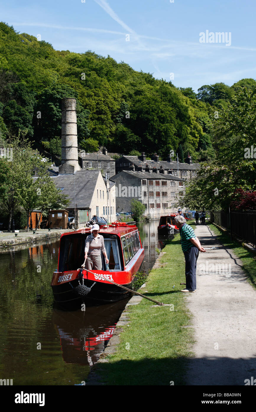 A narrowboat mooring on the Rochdale Canal at Hebden Bridge in West ...
