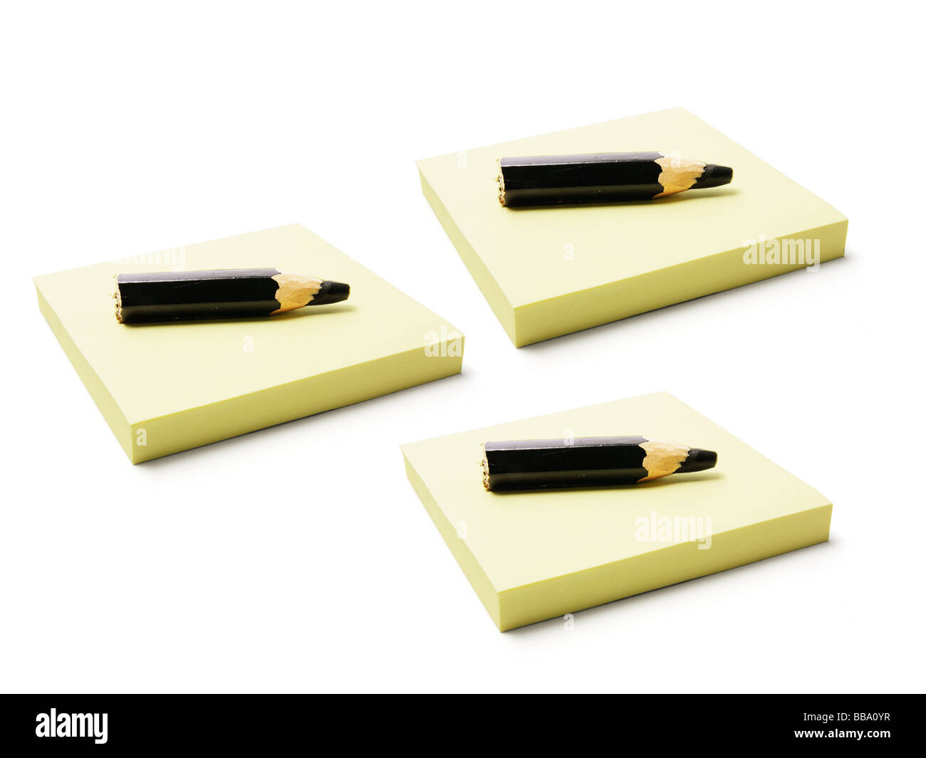 Black Pencils on Post It Note Pads Stock Photo - Alamy